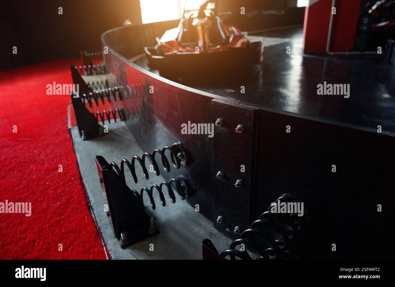 Details of modern indoor go kart racing track Stock Photo - Alamy