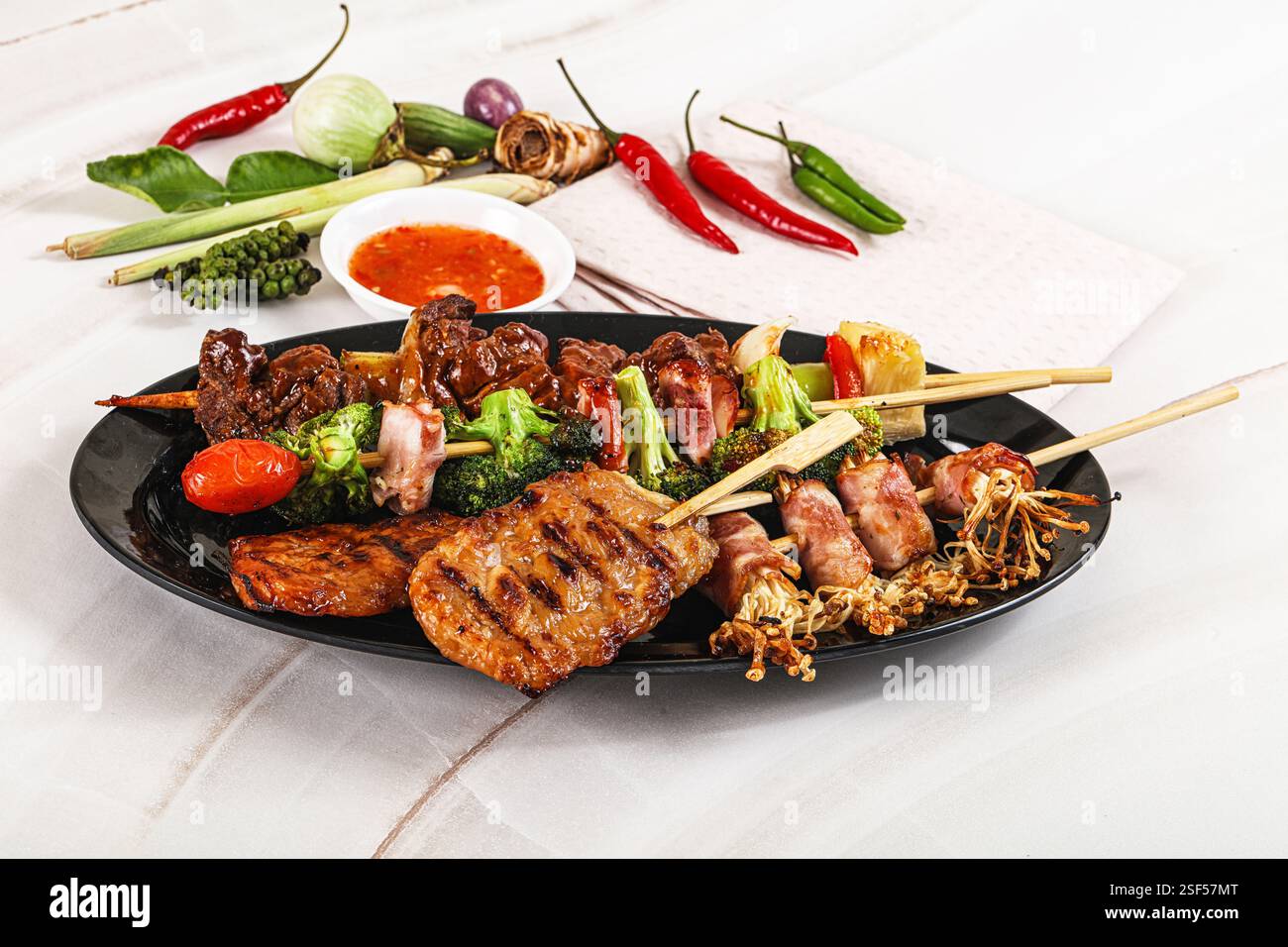 Asian grilled skewer assortment satay with beef, porl, chicken and ...