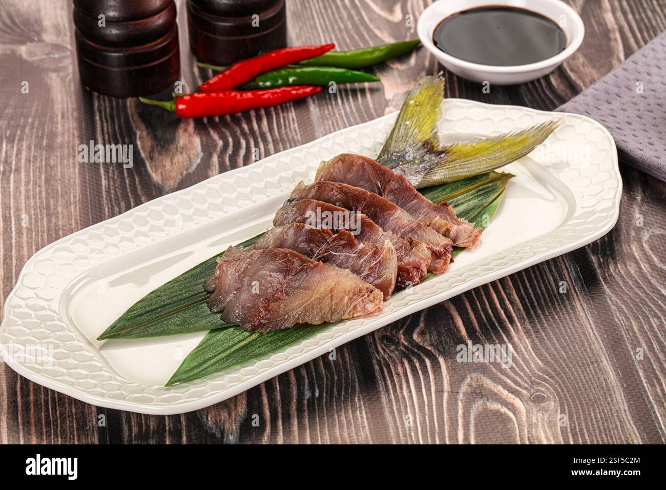 Raw yellowtail fresh fish sashimi snack Stock Photo - Alamy