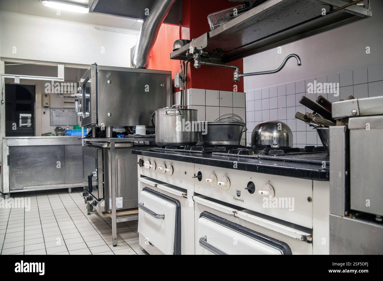Professional kitchen in restaurant Work surface and kitchen equipment ...