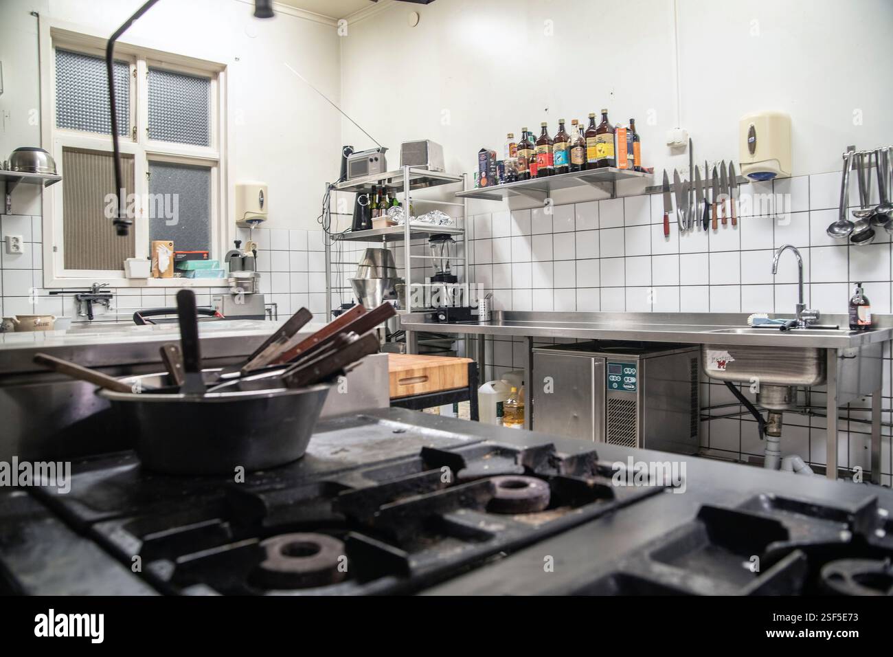 Professional kitchen in restaurant Work surface and kitchen equipment ...