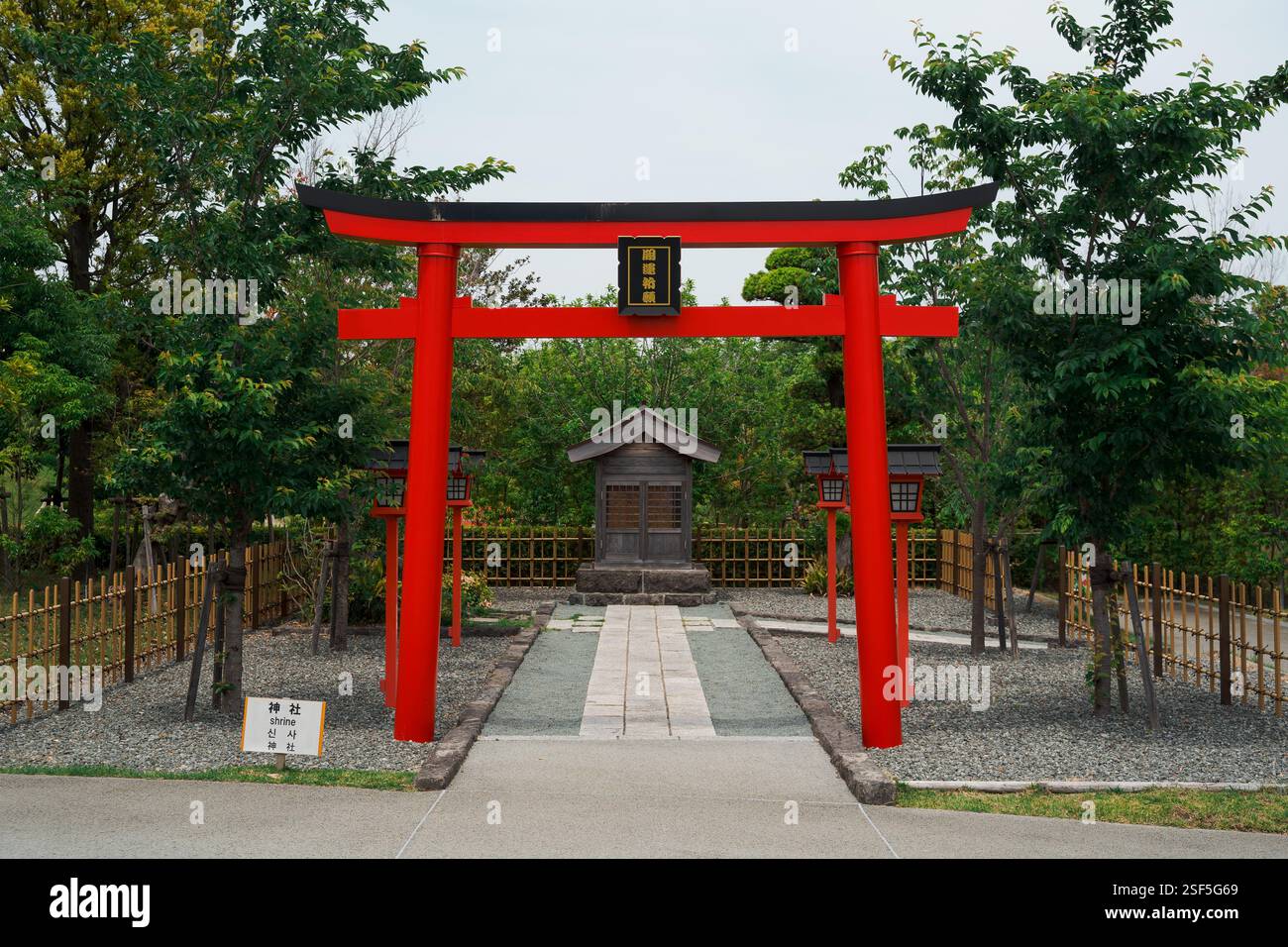 a Traditional Japanese entrance gate called Torii with red color. a ...