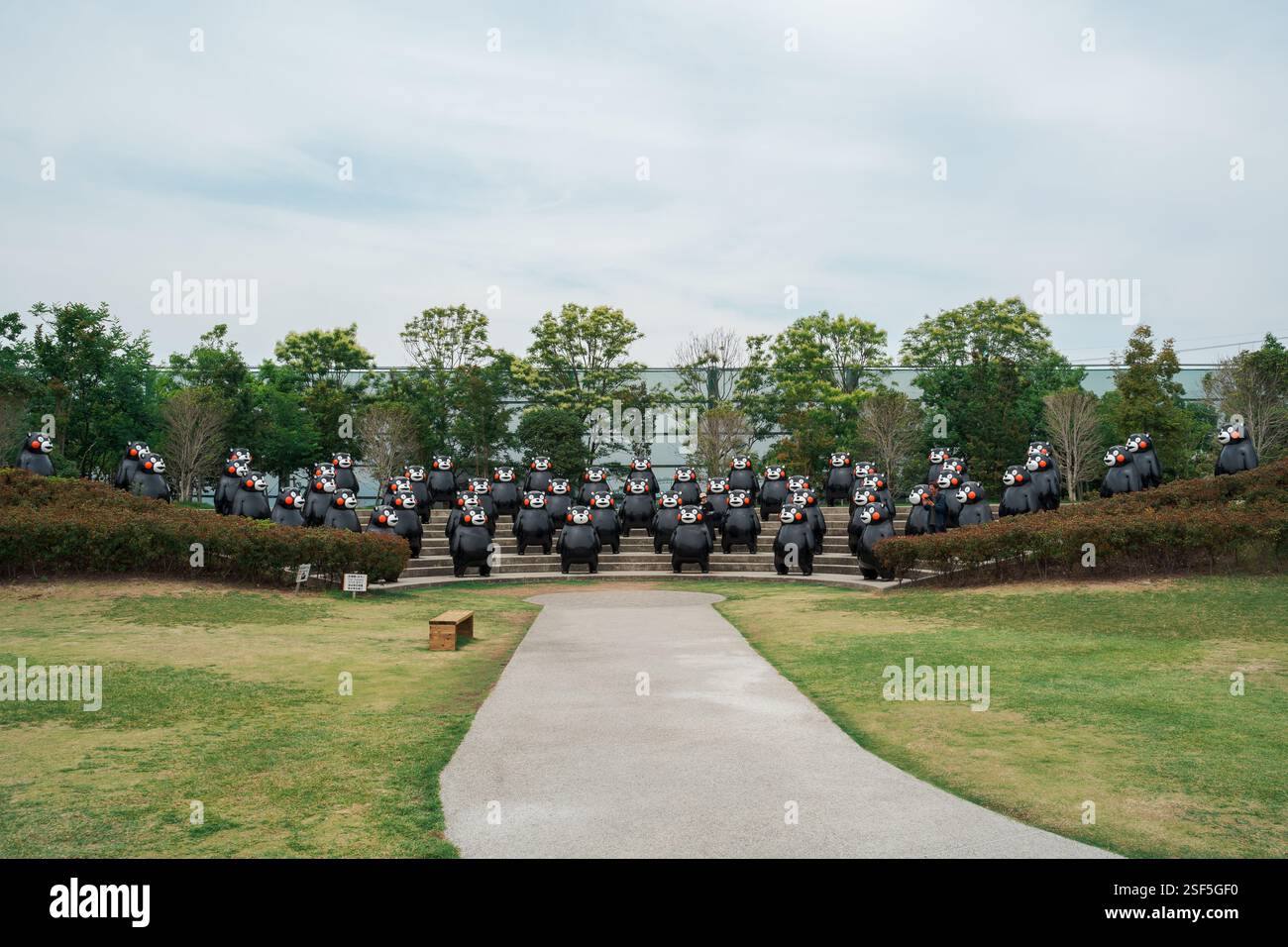 a Group of Kumamon statue, a mascot from Yatsushiro, Japan. Isolated by ...