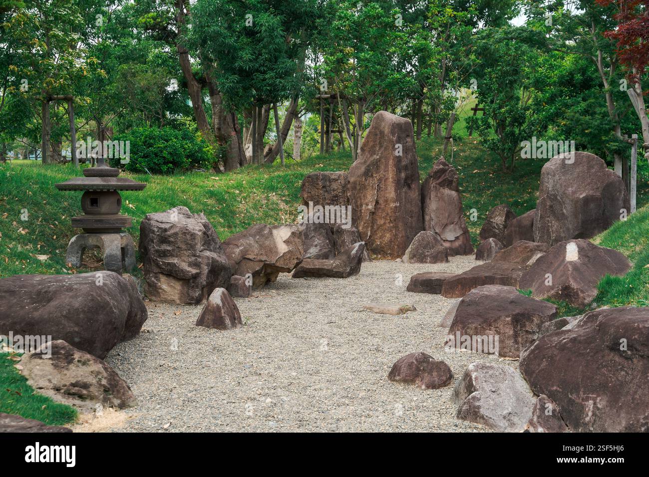 Japanese traditional garden in Yatsushiro, Japana with big stones as ...
