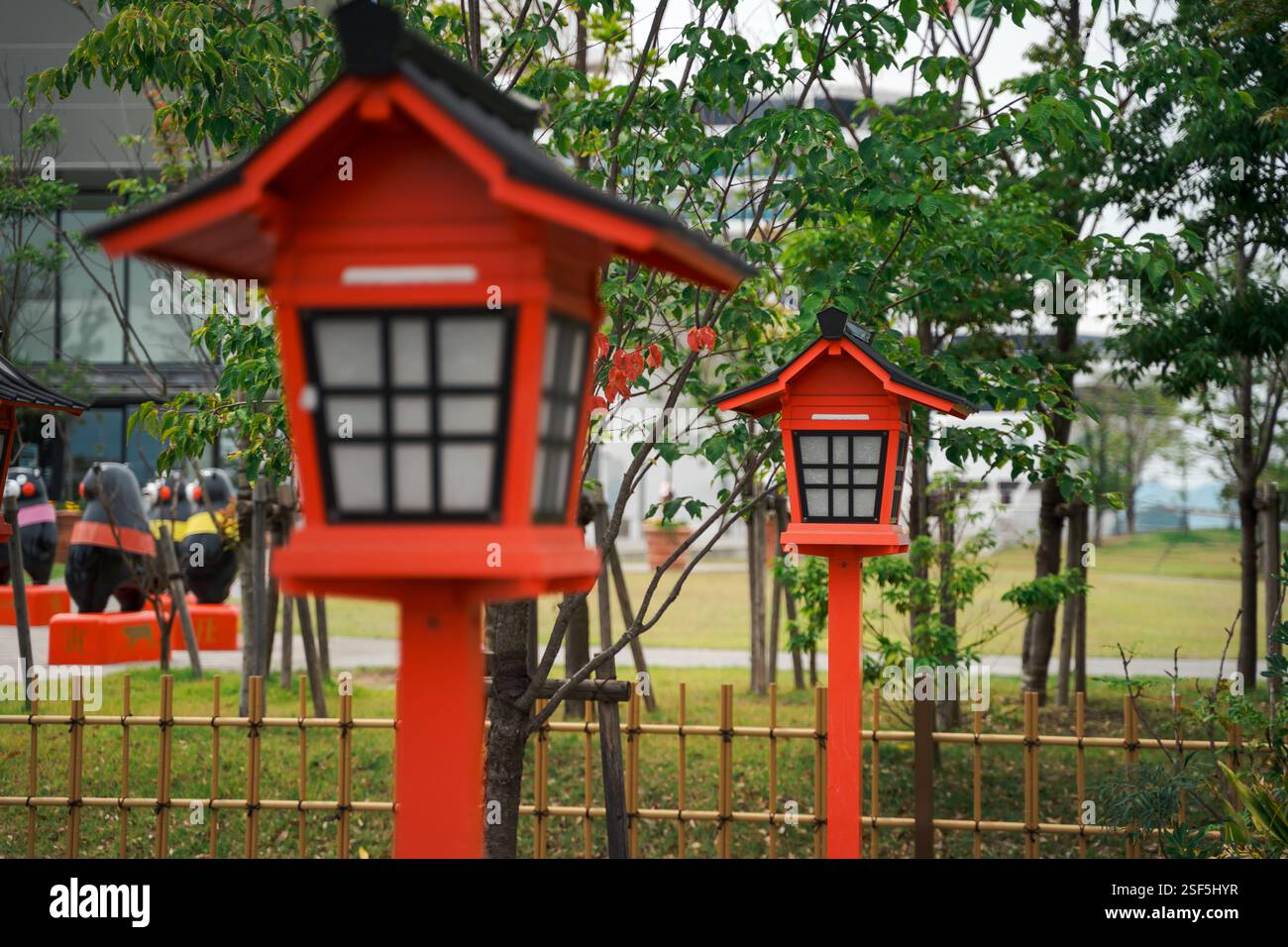Traditional Japanese red wooden lanterns called Toro, as outdoor garden ...