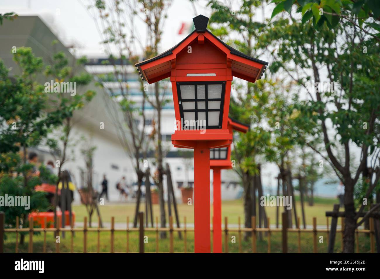 Traditional Japanese red wooden lanterns called Toro, as outdoor garden ...