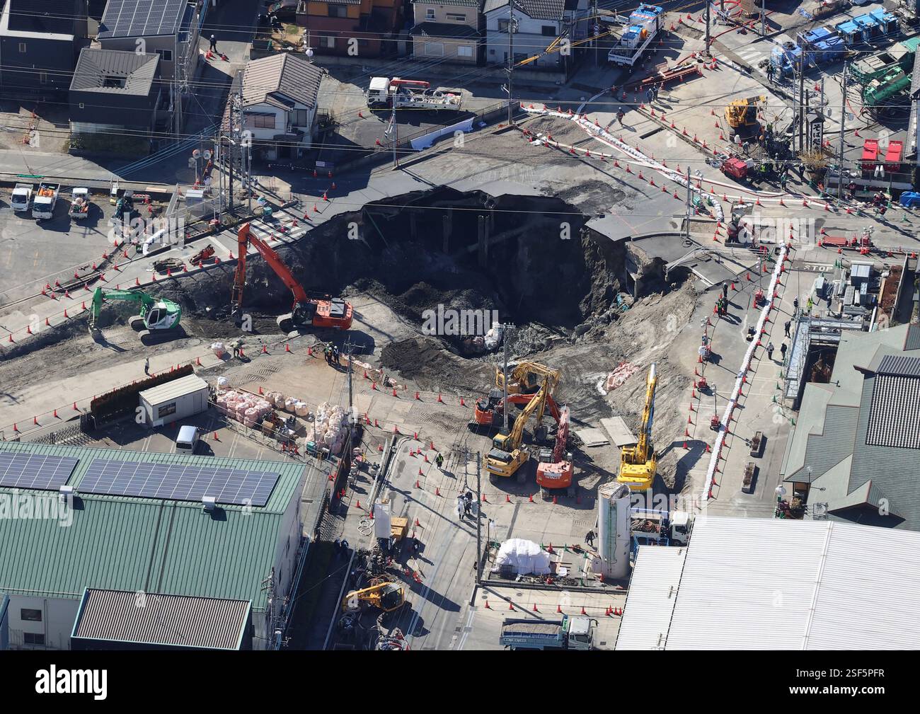 An aerial photo shows the collapsed site of a prefectural road waiting ...
