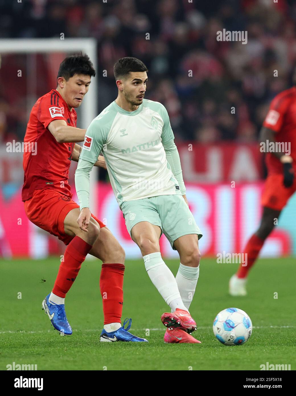 MUNICH, GERMANY - FEBRUARY 07: Andre Silva of Werder Bremen vies with ...