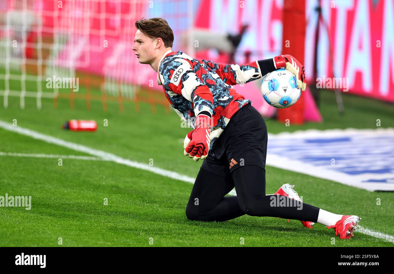 MUNICH, GERMANY - FEBRUARY 07: Jonas Urbig of Bayern Muenchen warming ...