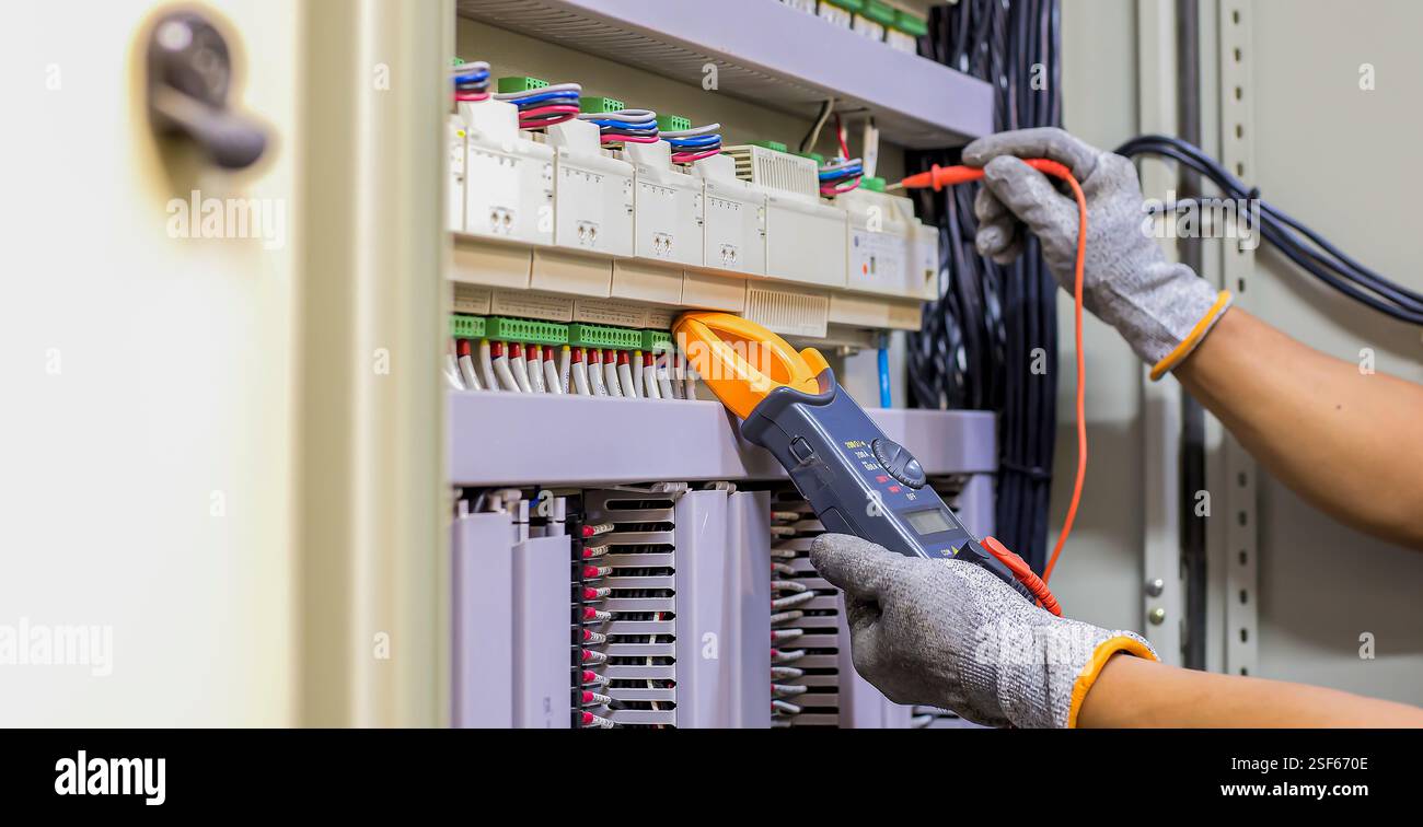 Technician checks electrician digital hi-res stock photography and ...
