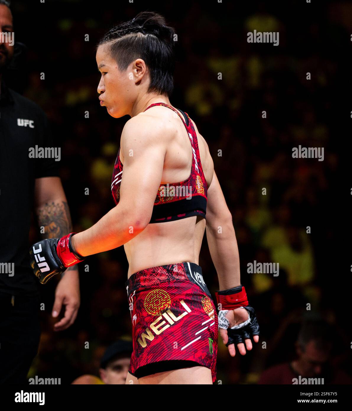 Sydney, Australia. 9th Feb, 2025. Zhang Weili of China reacts before ...