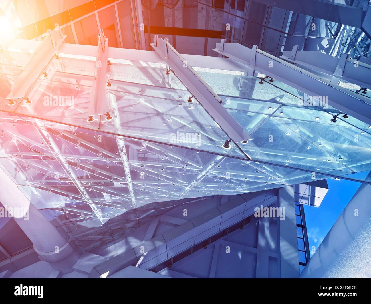 A modern tall building that features a significant amount of glass ...