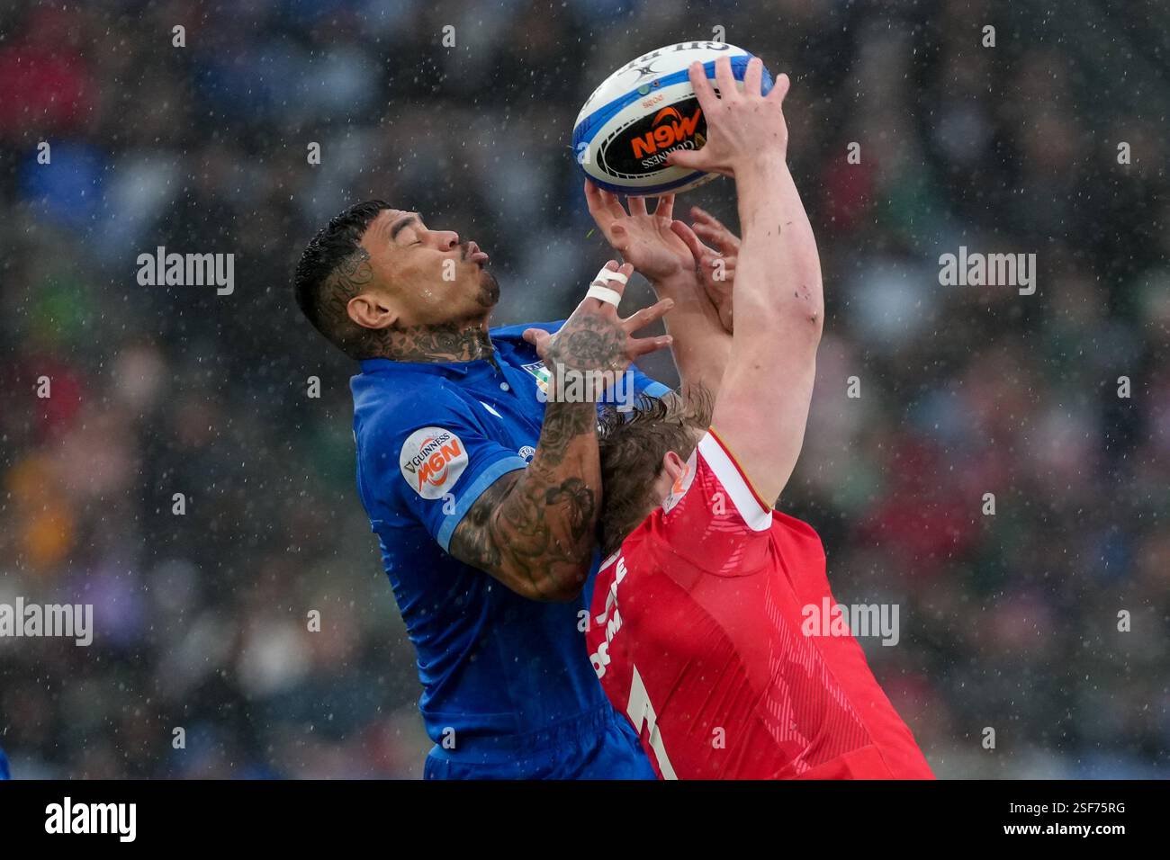 Monty Ioane of Italy and Jac Morgan of Wales during the Six Nations ...