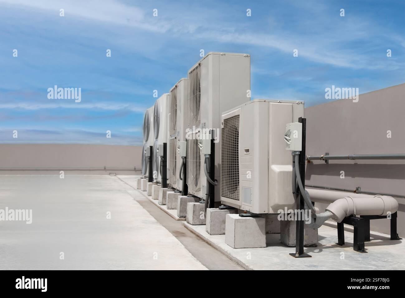 Air conditioning (HVAC) installed on the roof of industrial buildings ...