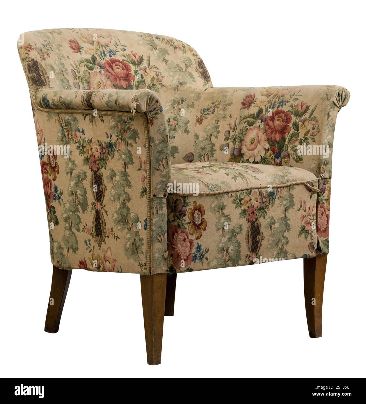 Classic, upholstered club chair with a floral pattern, isolated on a ...