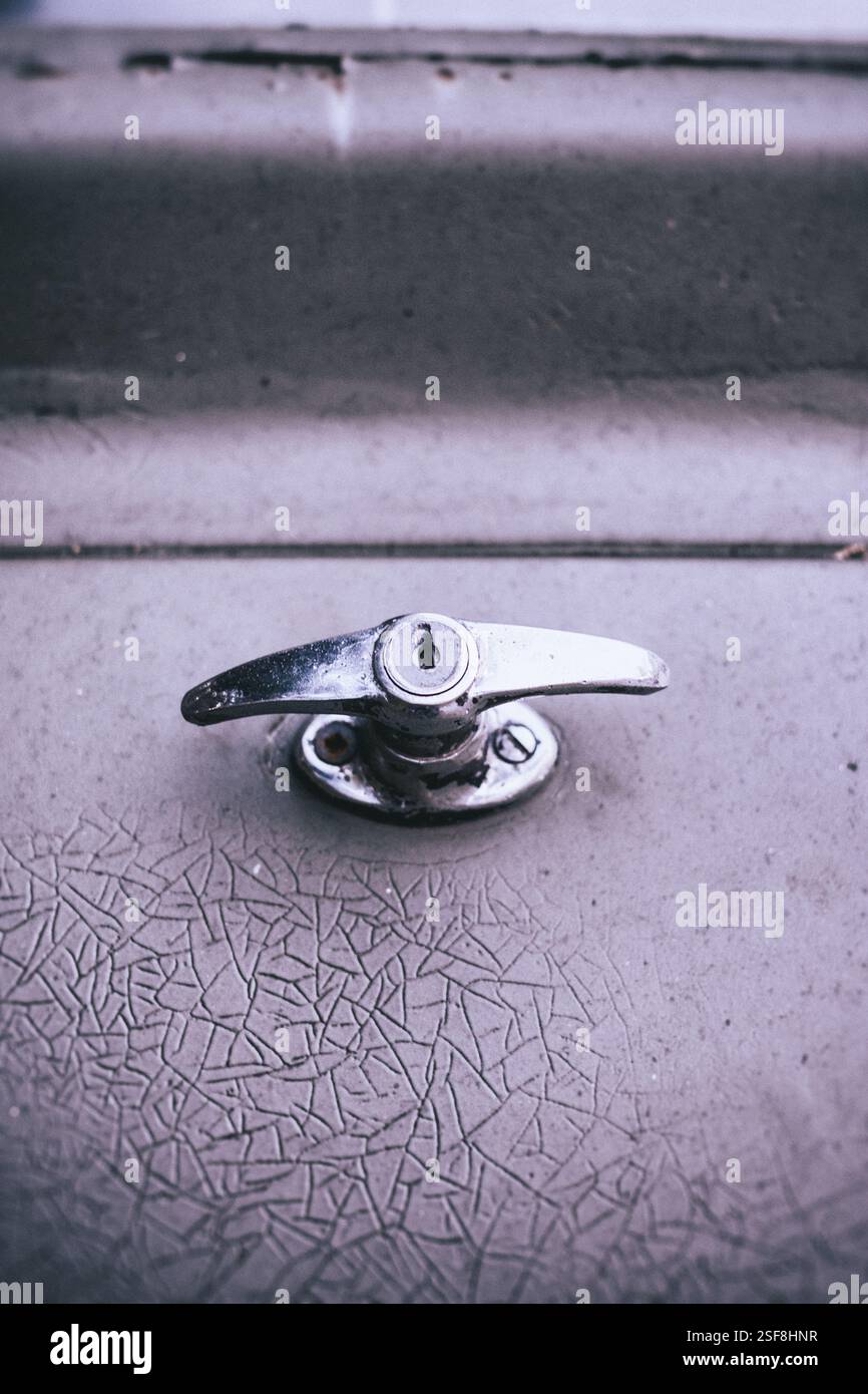 Car boot handle on a classic car Stock Photo - Alamy