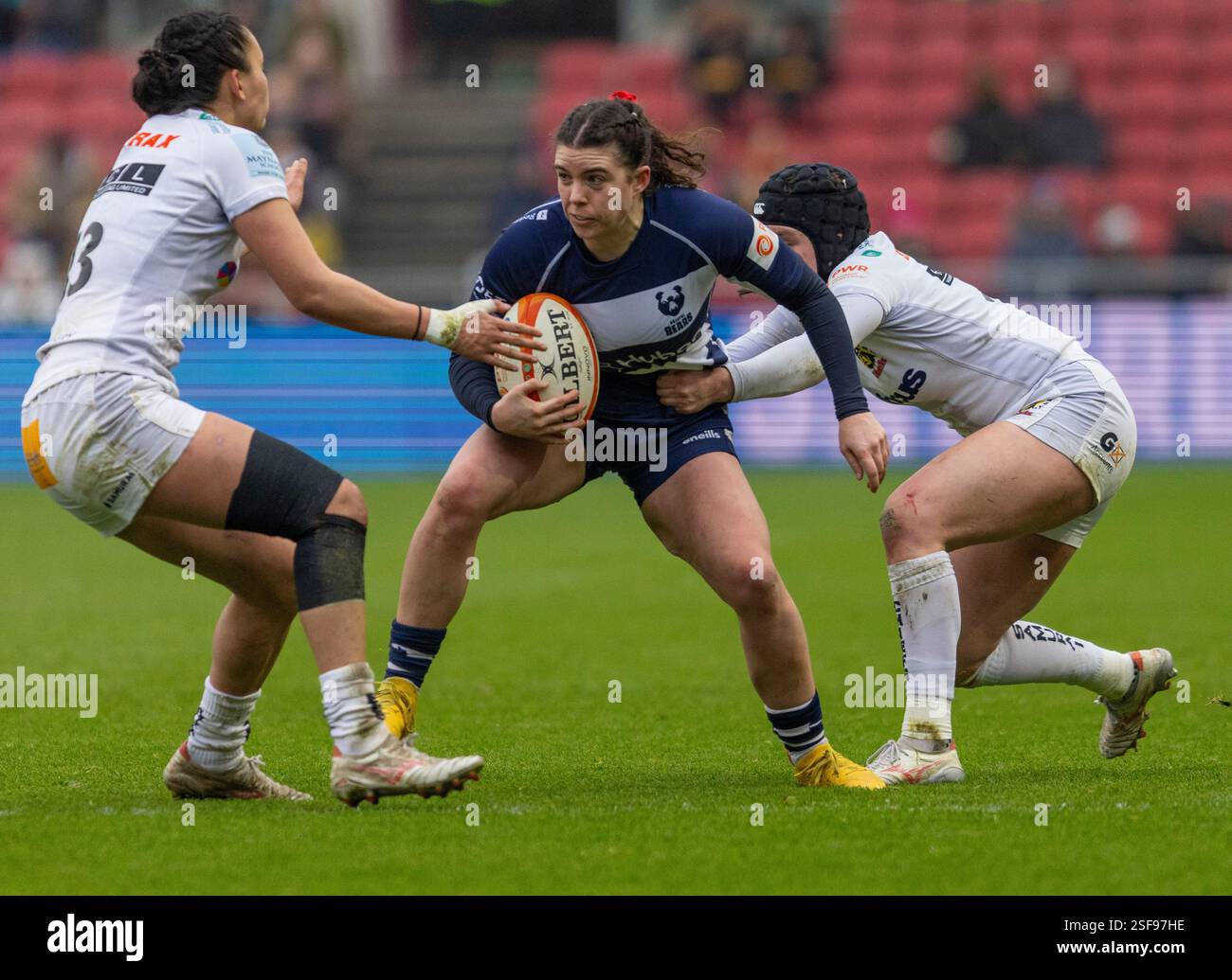 Bristol's Phoebe Murray about to be tackled by Exeter’s Nancy ...