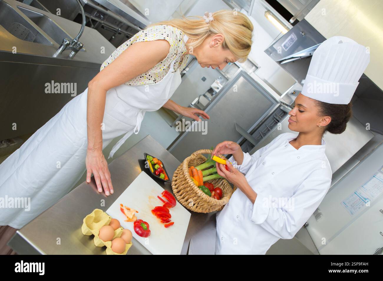 Female chef teaching senior hi-res stock photography and images - Alamy