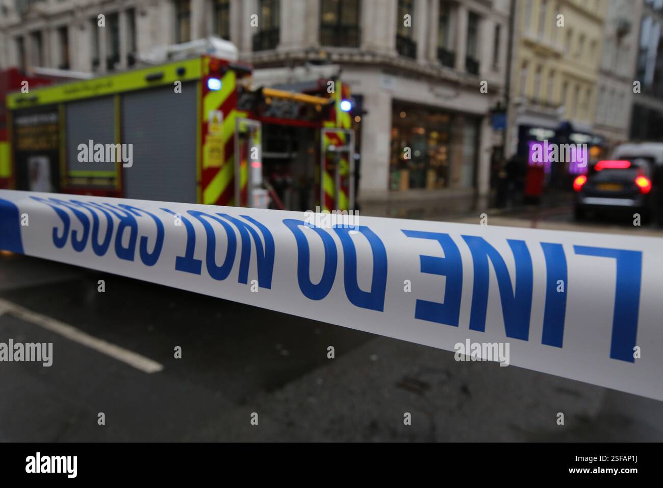 London, UK. 08th Feb, 2025. A cordon is extended around the scene of ...
