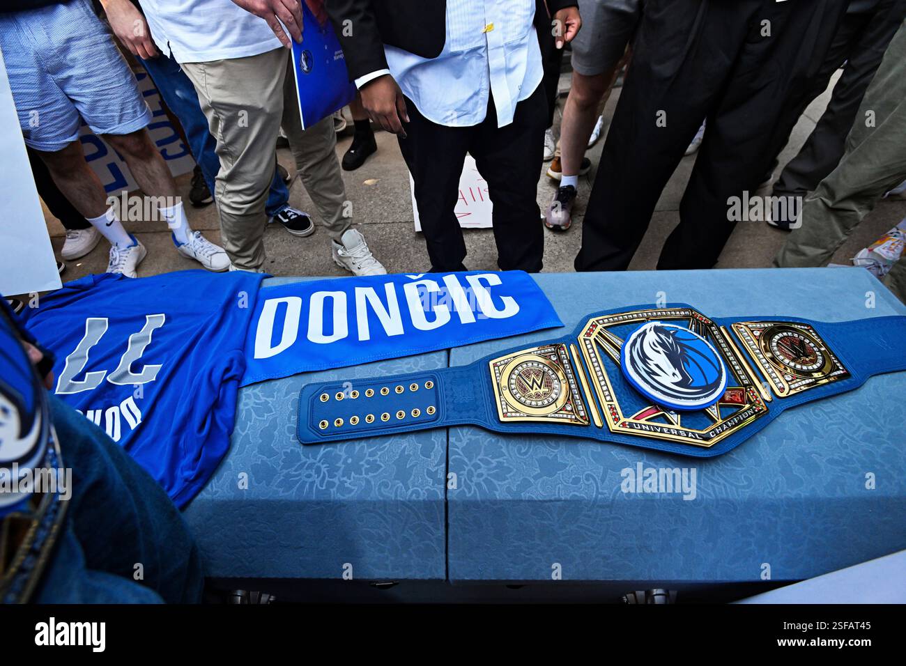DALLAS, TX - FEBRUARY 08: Dallas Mavericks fans lay several items on a ...