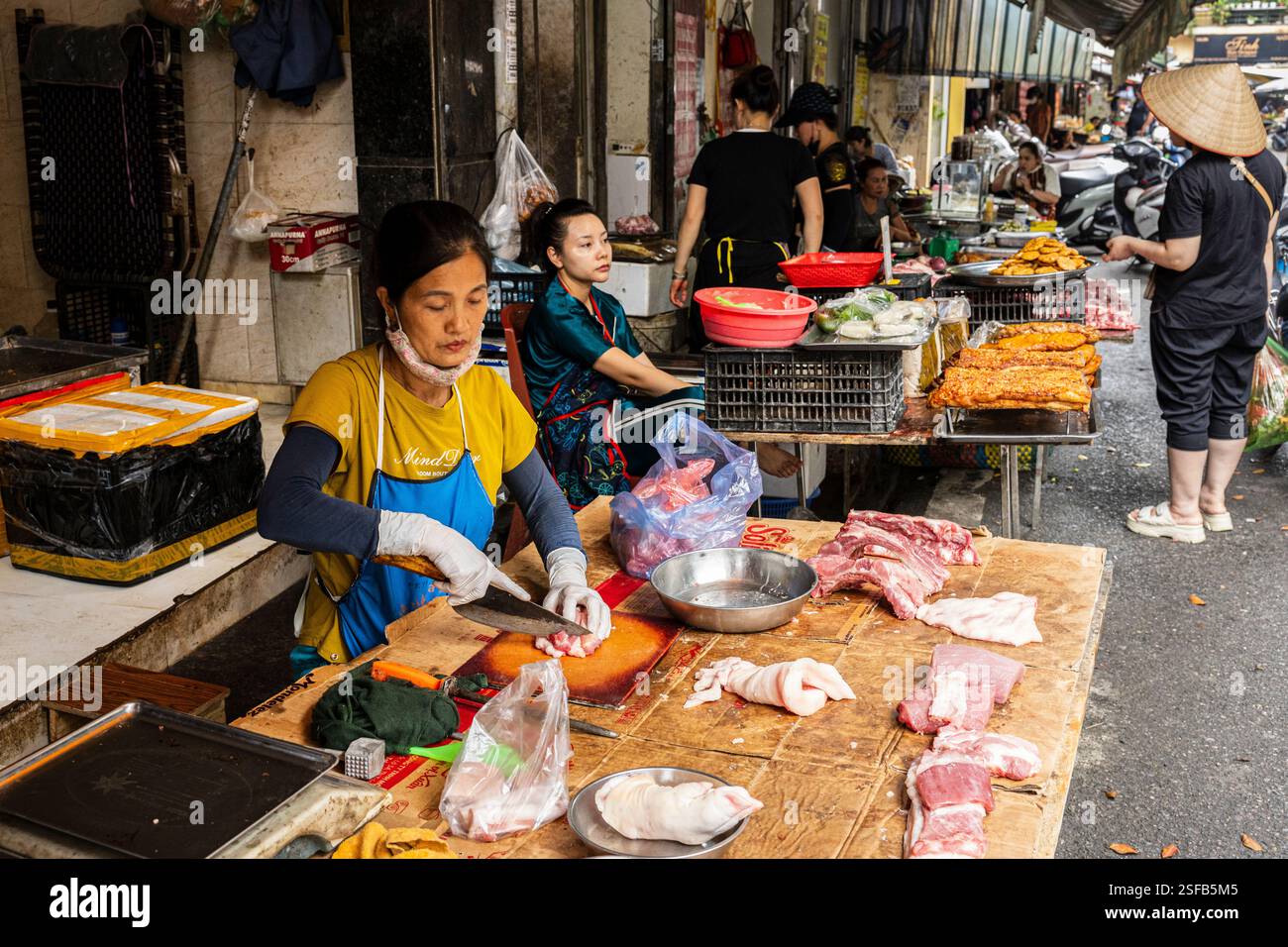 Hanoi, Vietnam - 31 July 2024 : Street butcher Stock Photo - Alamy