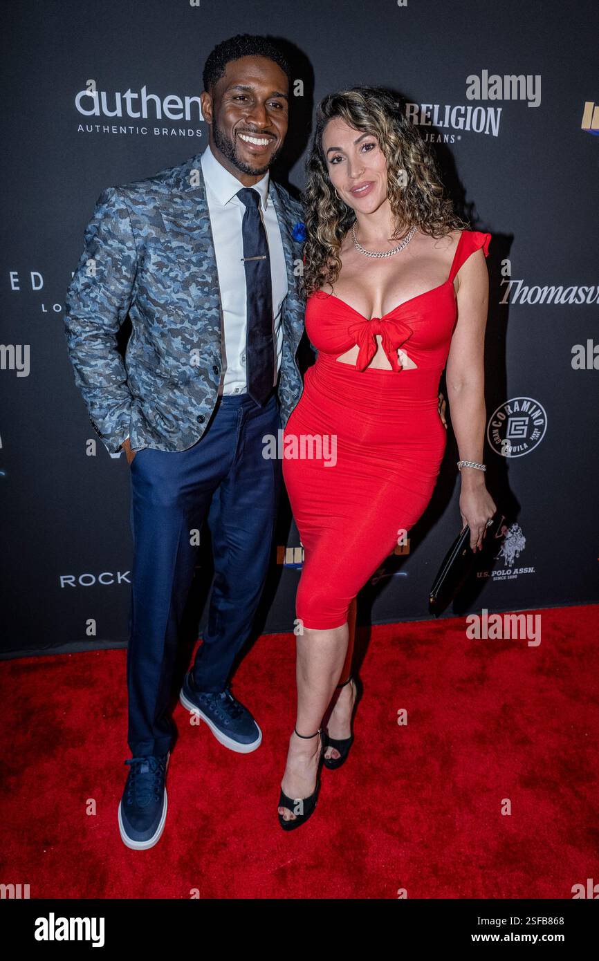 Reggie Bush, left, and Lilit Bush attend the Sports Illustrated Super ...