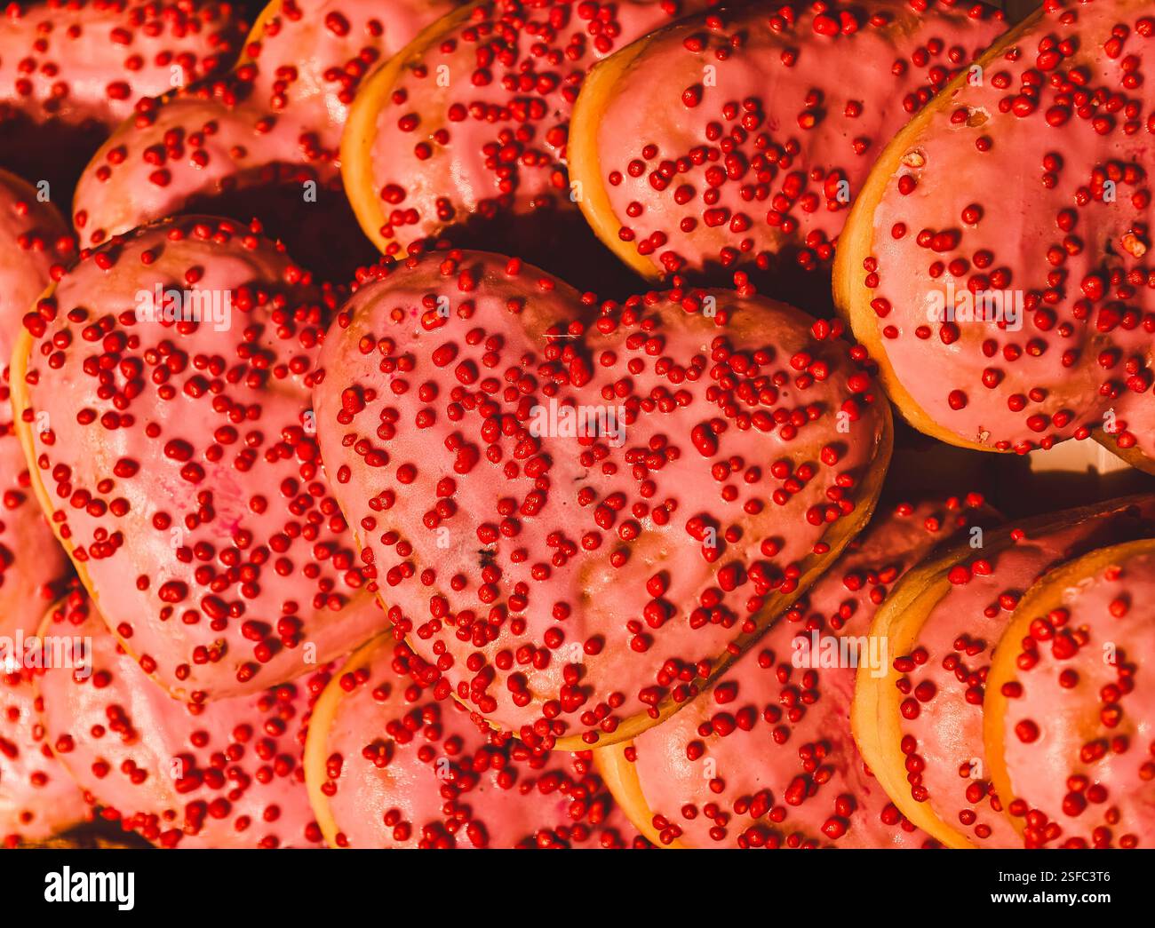 Heart shaped gingerbread cookies with red sprinkles. Valentine's Day ...
