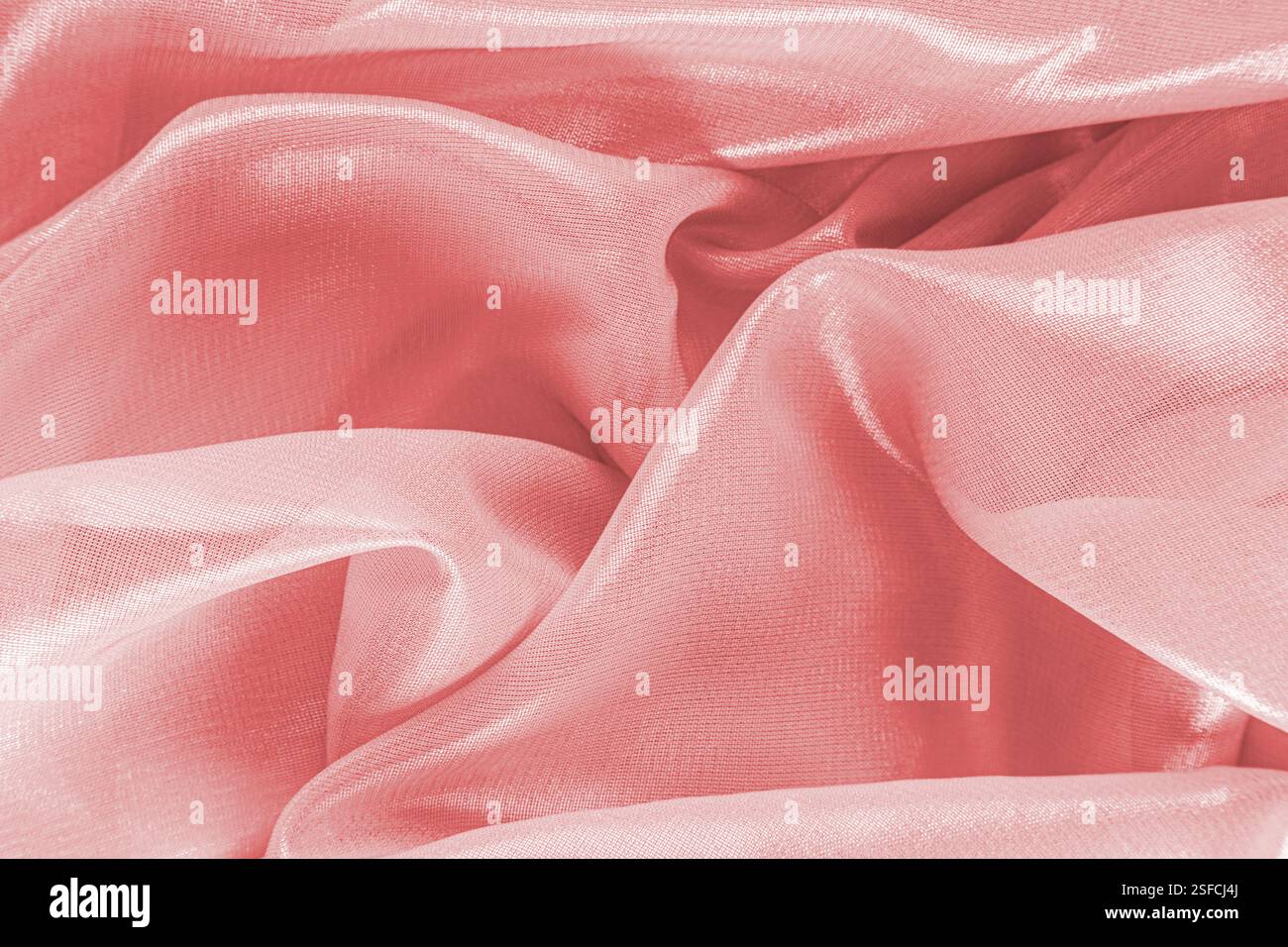 Abstract background silk ,chiffon texture fabric pink, coral color ...