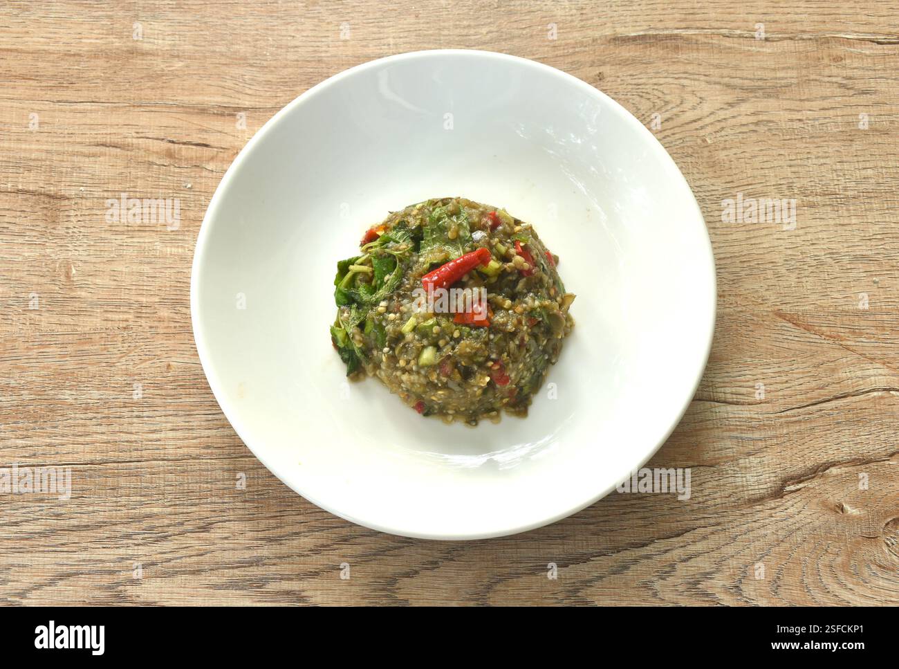 mashed spicy and sour eggplant salad Thai eastern style food on plate ...