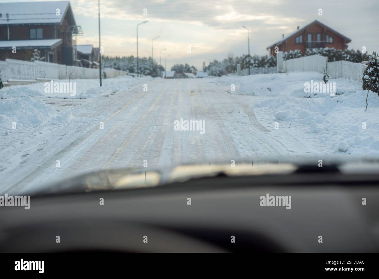 driving on empty ice road in town, no people Stock Photo - Alamy