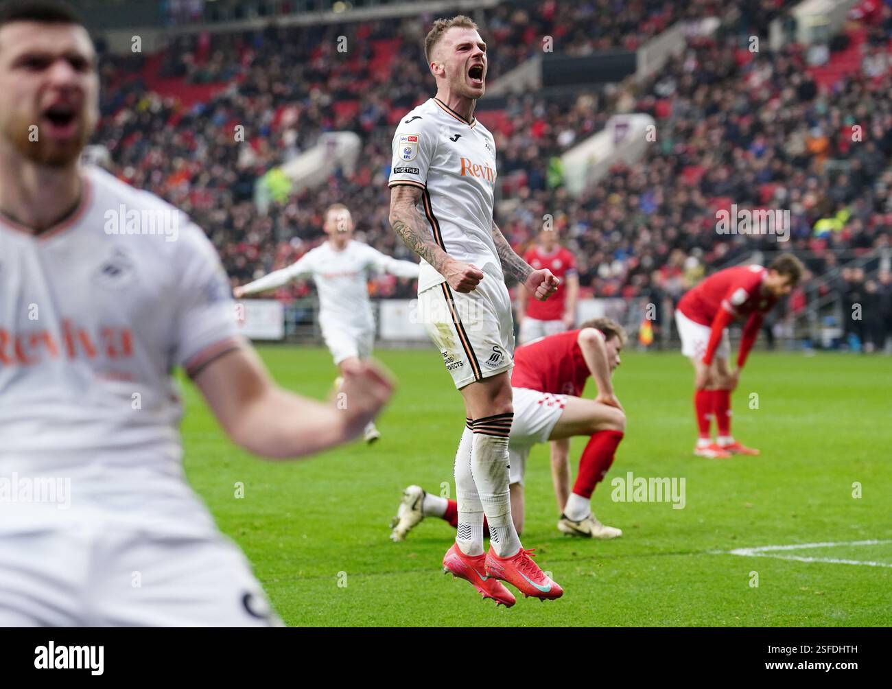 Swansea City's Josh Tymon celebrates scoring their side's first goal of ...