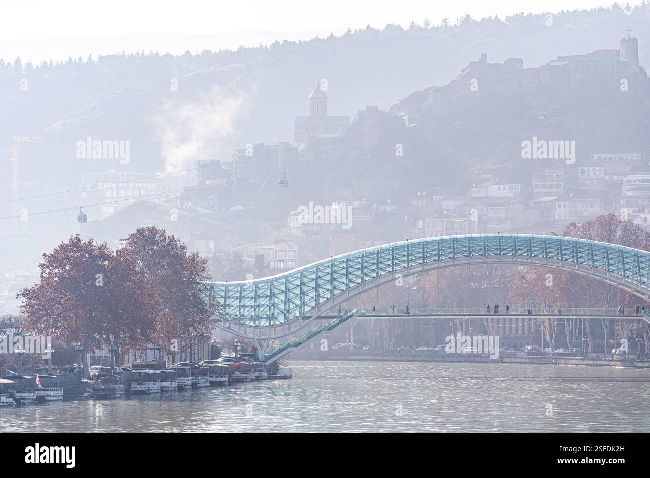 Peace bridge over the Kura River and Kala skyline, Old Town, Tbilisi ...