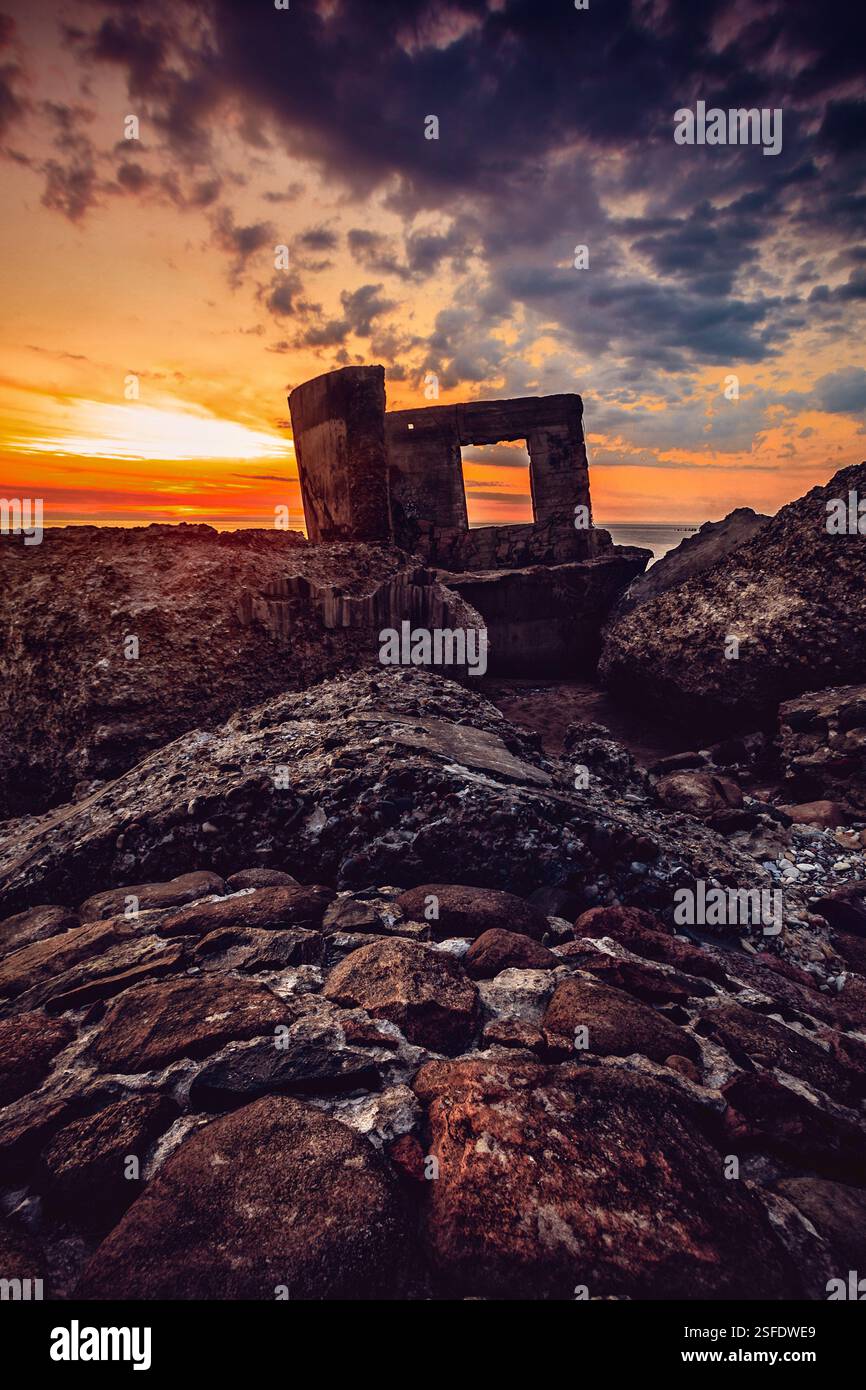 Concrete fortifications on beach at sunset, Karosta, Liepaja, Latvia ...