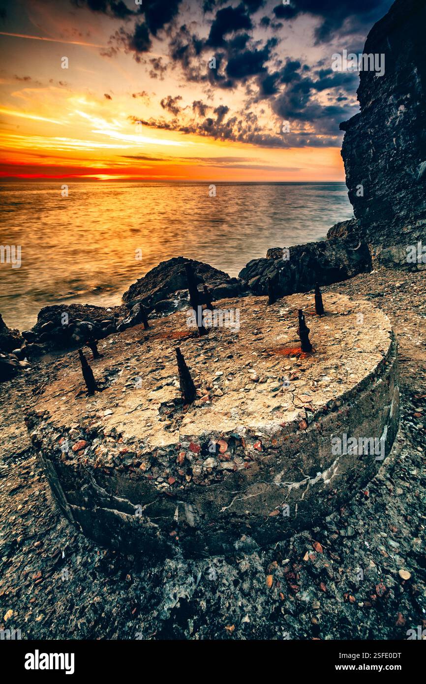Concrete fortifications on beach at sunset, Karosta, Liepaja, Latvia ...