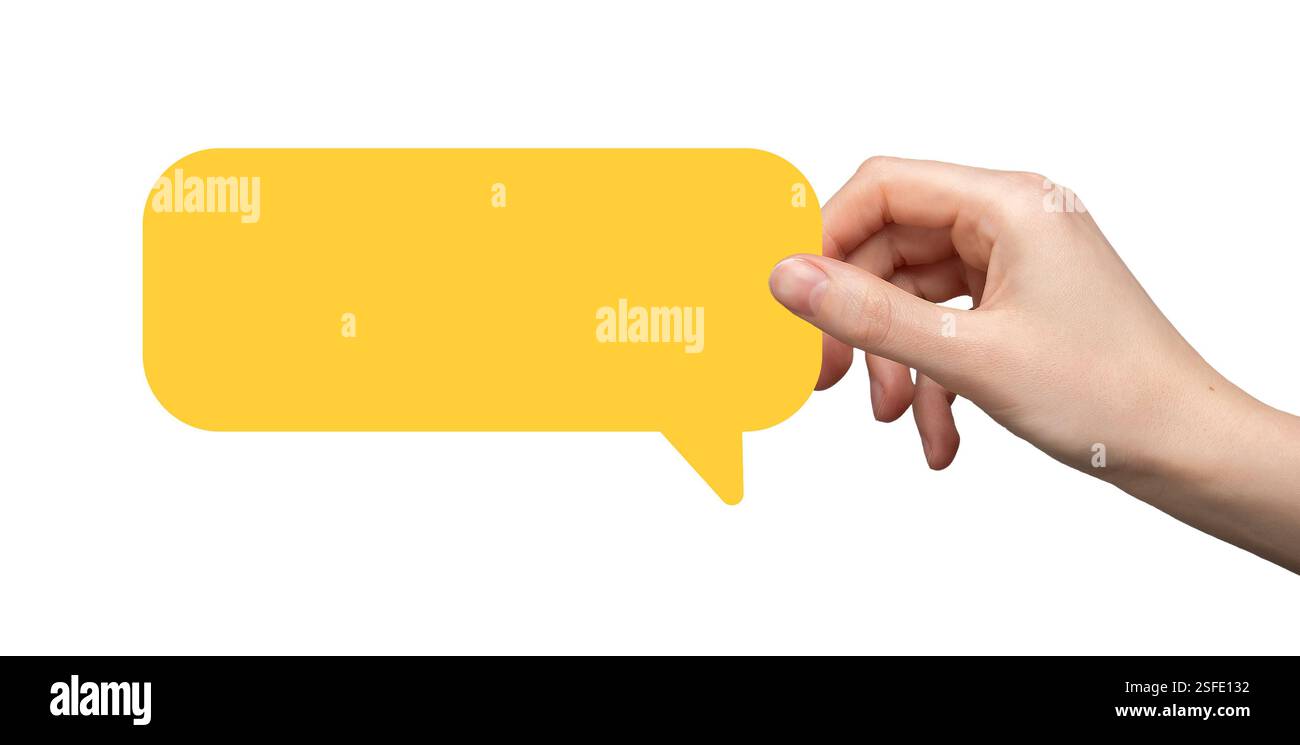 Hand holding a yellow speech bubble, symbolizing communication ...