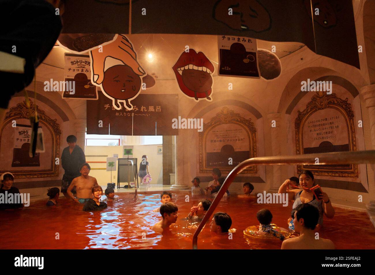 Hakone, Japan. 09th Feb, 2025. Bathers enjoy in a chocolate bath at the ...