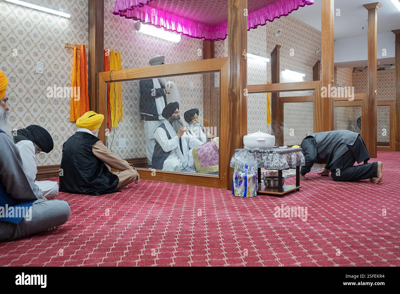 During an Akand Sahib reading of the entire Sikh bible, a priest ...