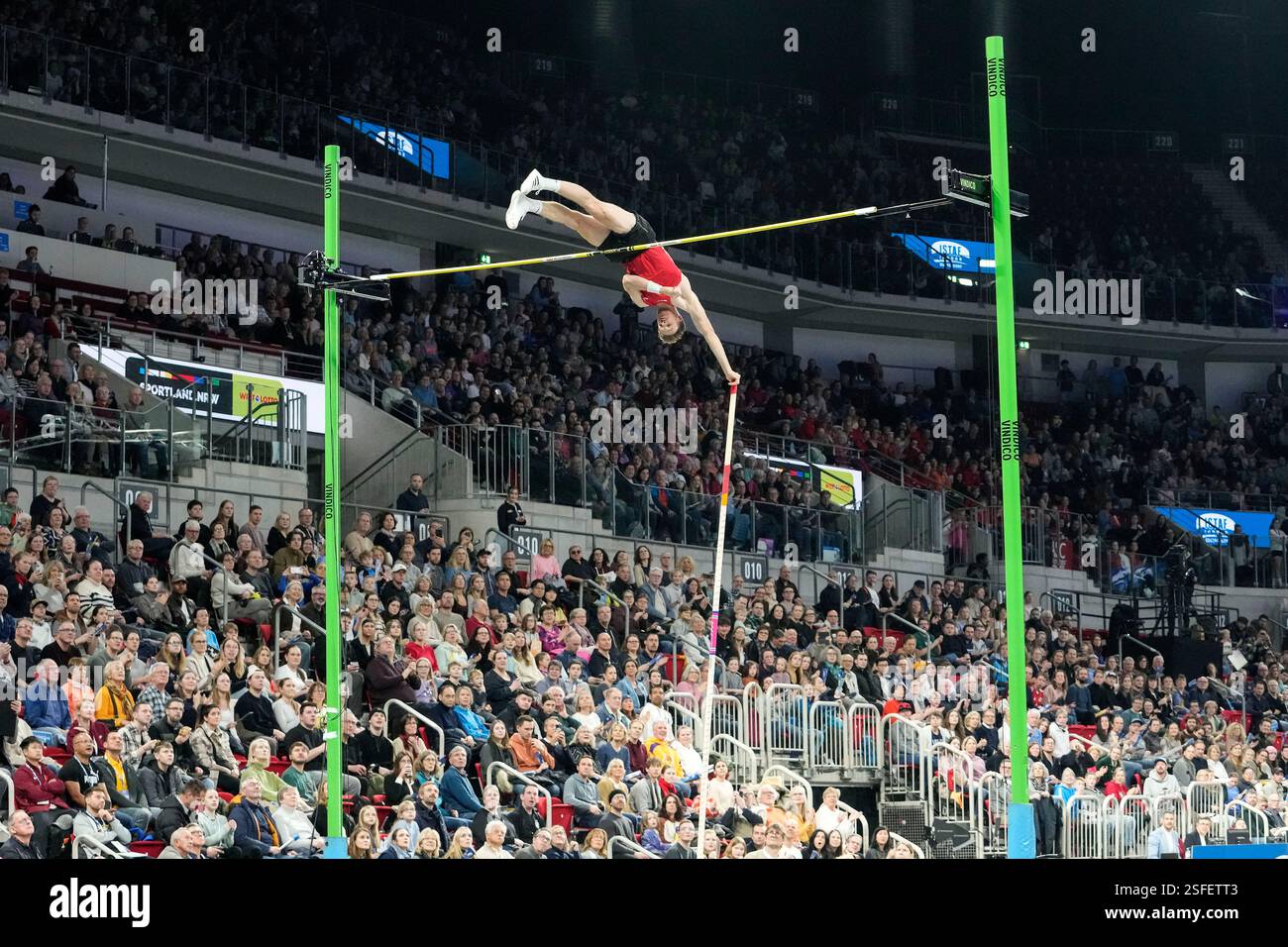 Torben Blech of Germany clears the bar during the pole vault ...