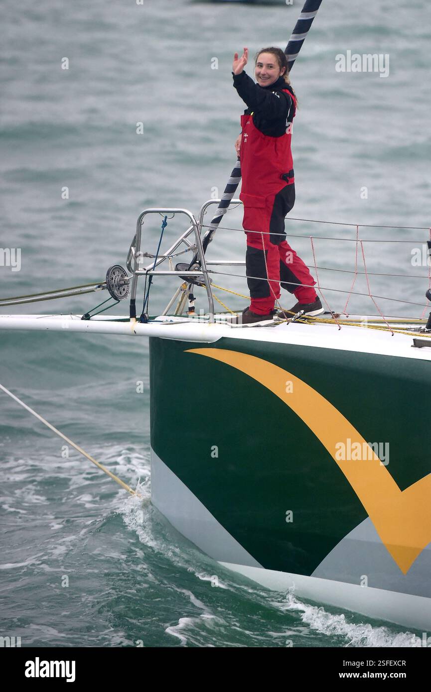 French skipper Violette Dorange celebrates on her Imoca monohull ...