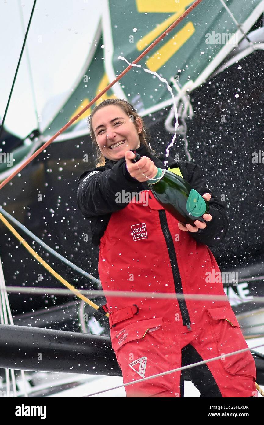 French skipper Violette Dorange celebrates on her Imoca monohull ...
