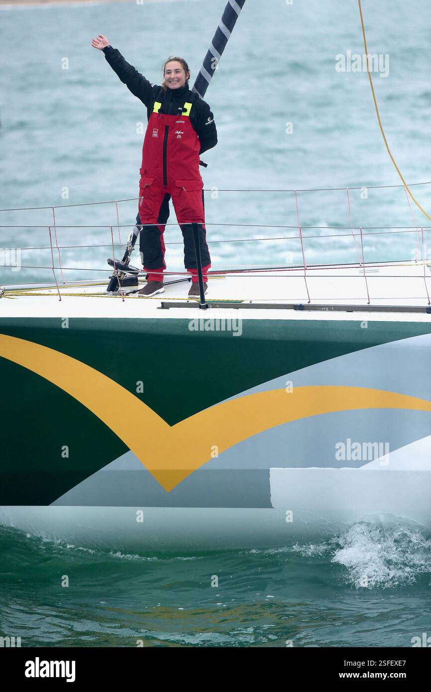 French skipper Violette Dorange celebrates on her Imoca monohull ...