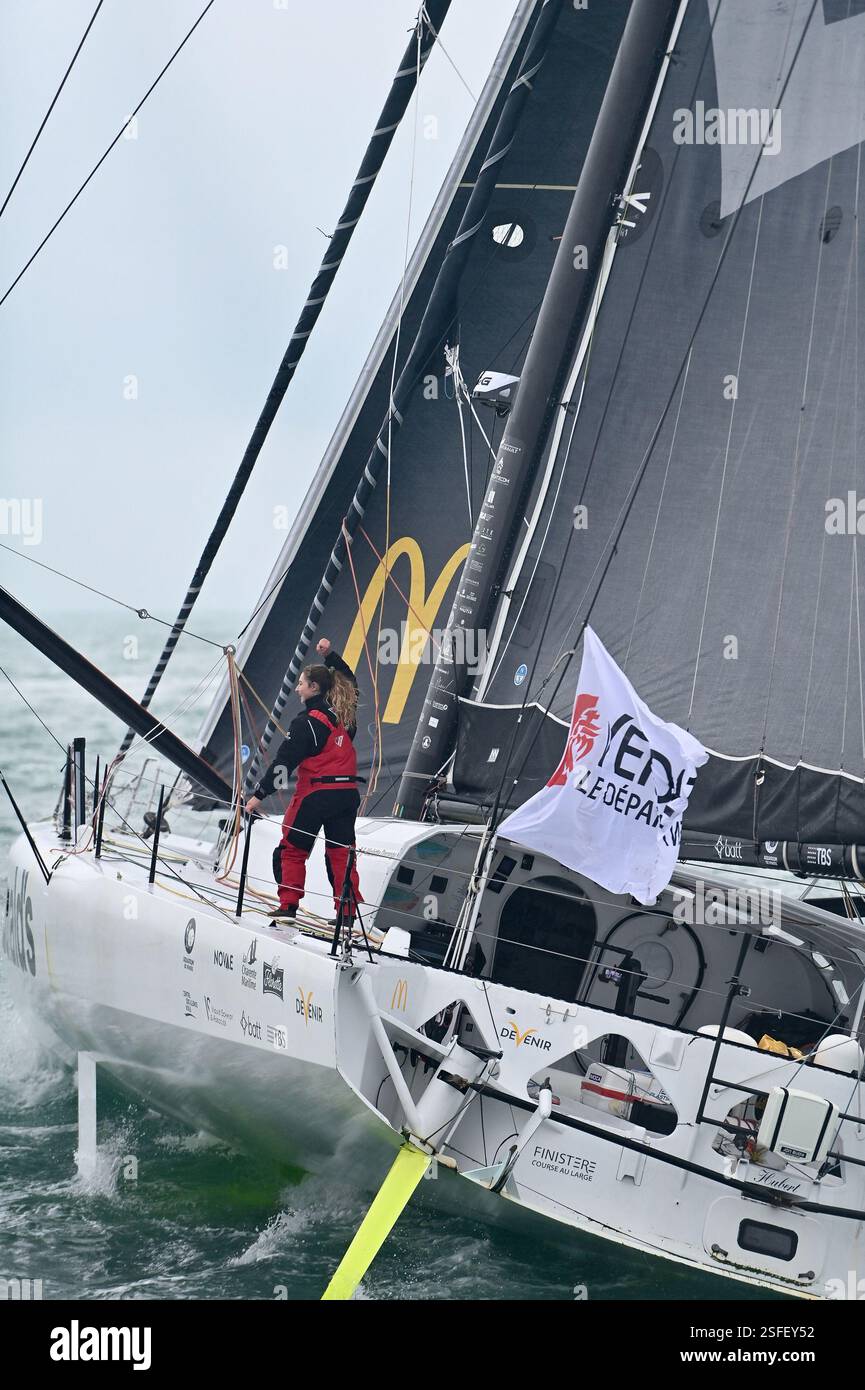 French skipper Violette Dorange celebrates on her Imoca monohull ...