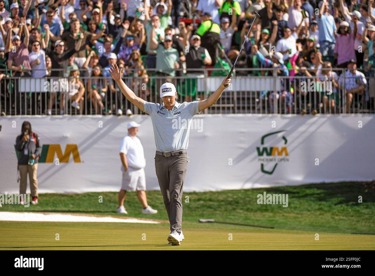 Mackenzie Hughes celebrates after a birdie on the 16th green during the ...