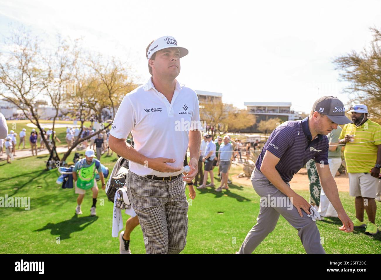 Keith Mitchell and Justin Thomas walk up on the third hole during the ...