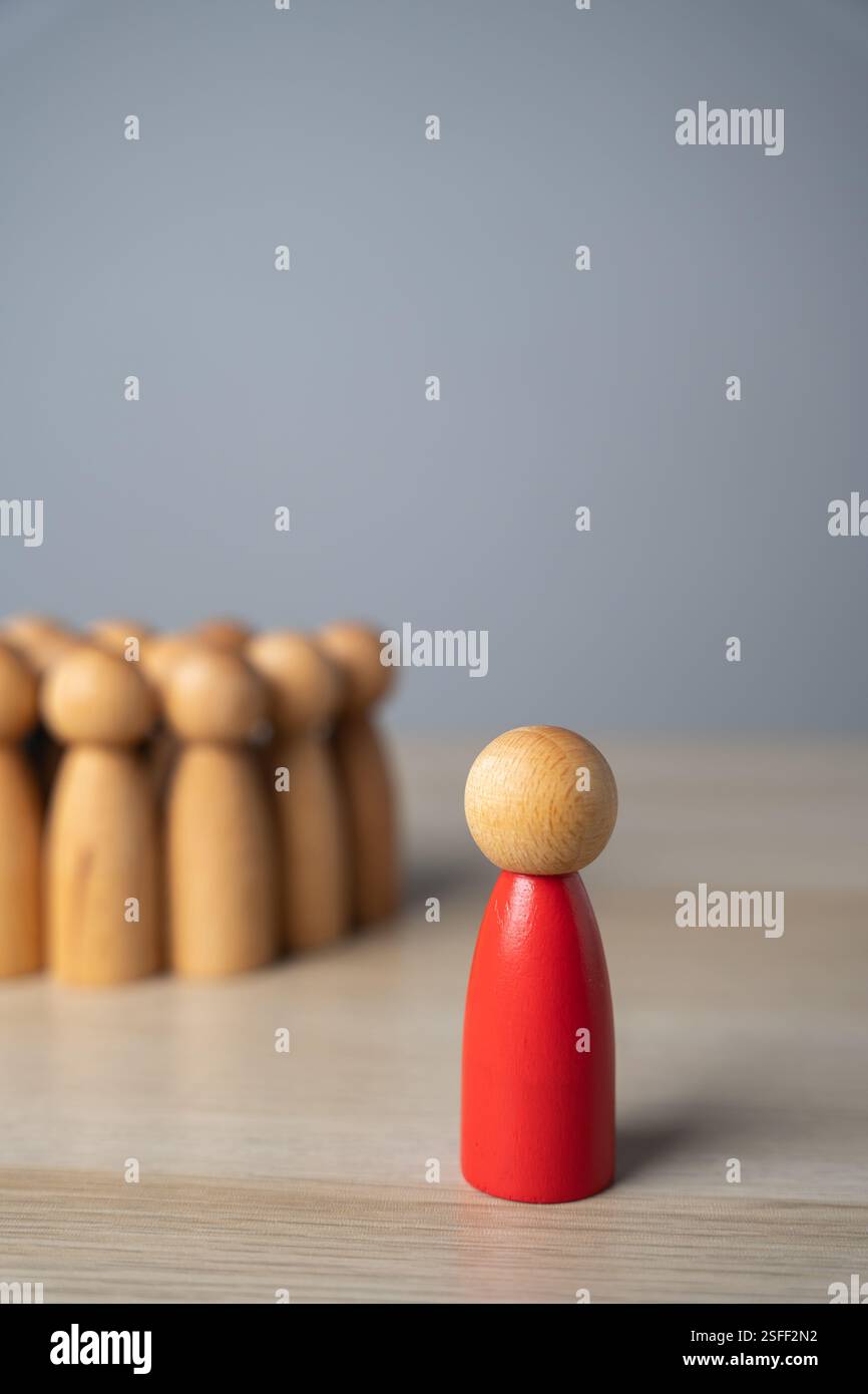 The red man stands away from the group, rejected and exiled. Social ...