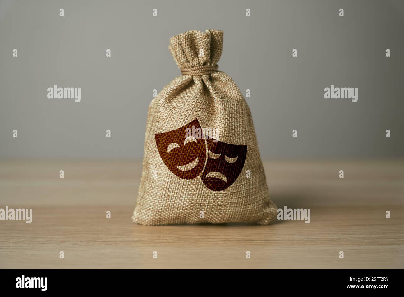 A bag with drawings of theatrical masks. The concept of good and bad ...