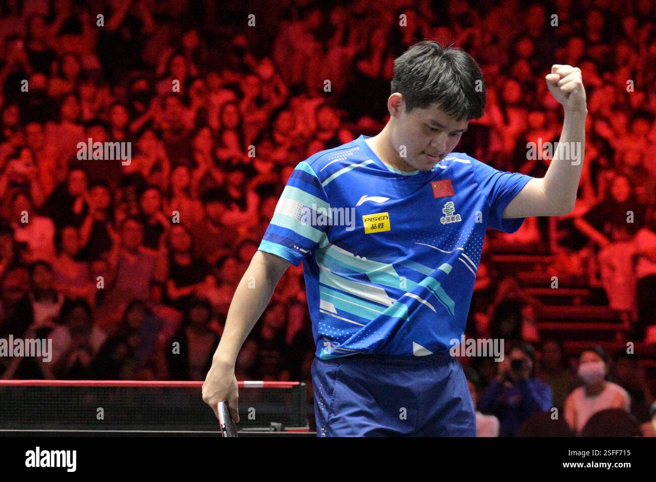 Singapore. 9th Feb, 2025. Lin Shidong celebrates winning the men's ...