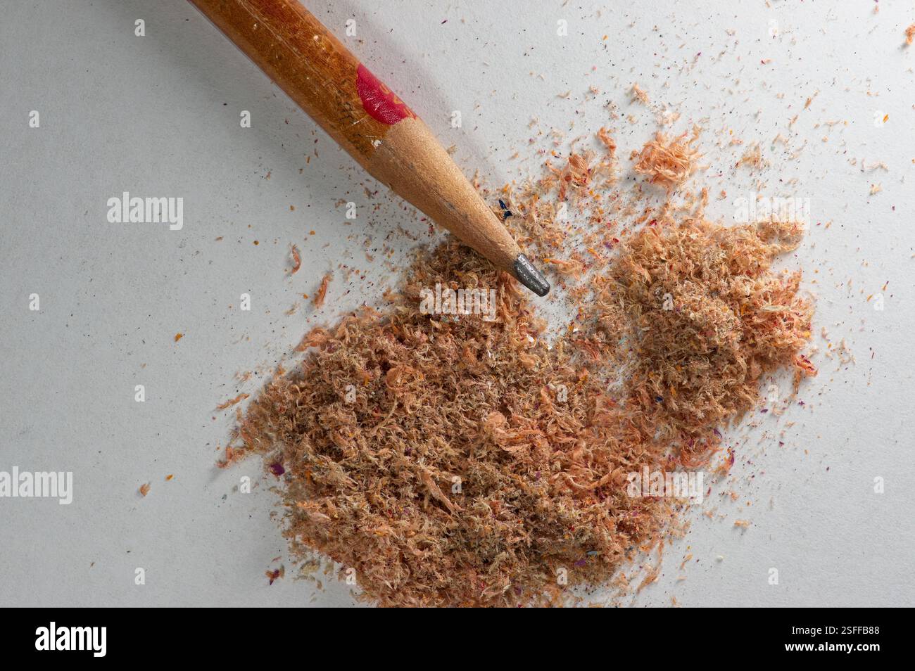 Blunt pencil end over sharpener dust Stock Photo - Alamy