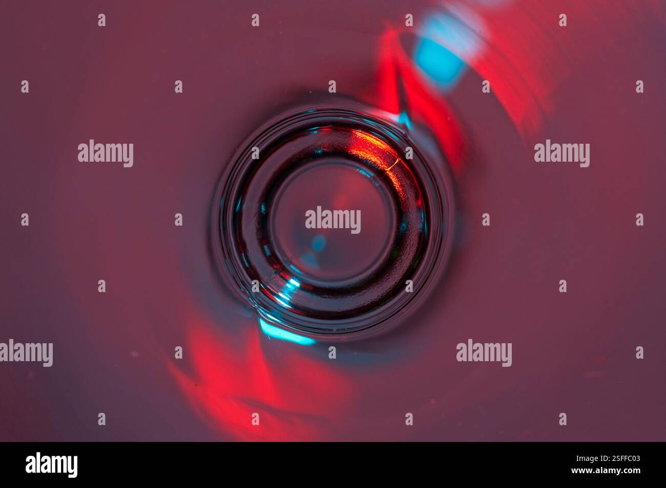 Abstract view of the bottom of a wine glass Stock Photo - Alamy