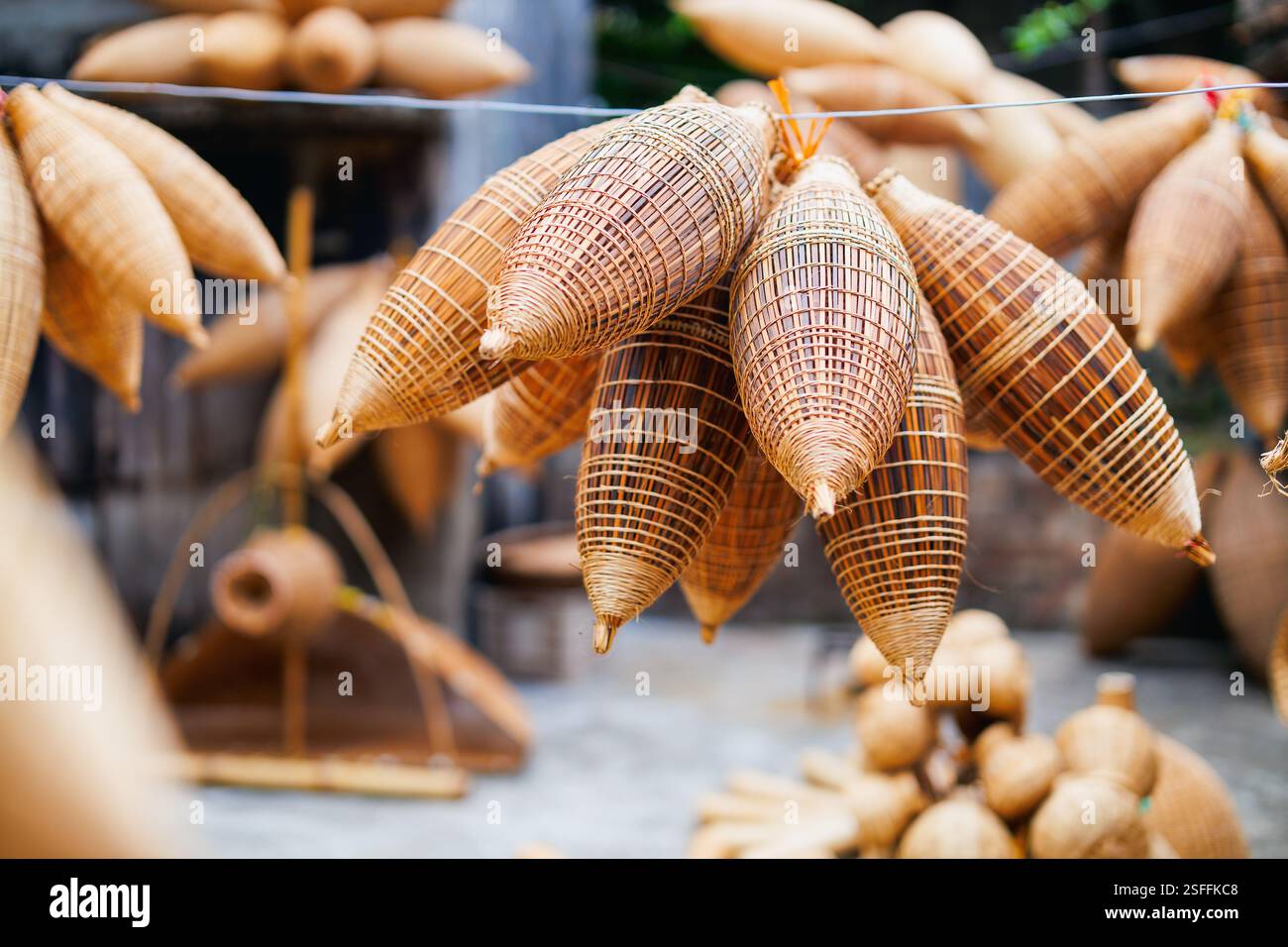 Close-up of traditional Vietnamese conical fish traps made from bamboo ...